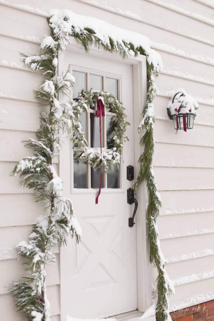 Christmas Door Decorations with Wreaths and Garlands | Julie Blanner